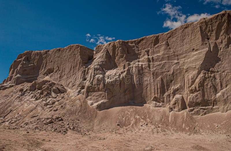A Big Pile of Fine Grain Sand Creating a Cliffside Stock Photo - Image ...