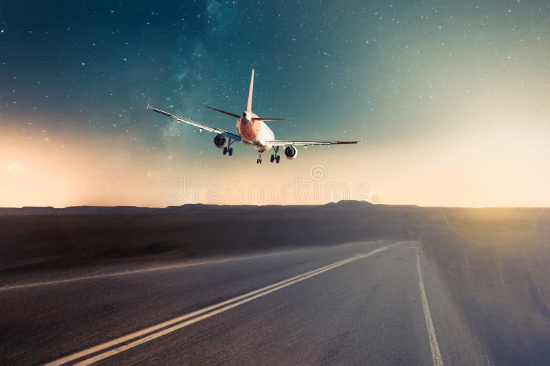 Big plane flying over road stock photo. Image of starry - 256310696