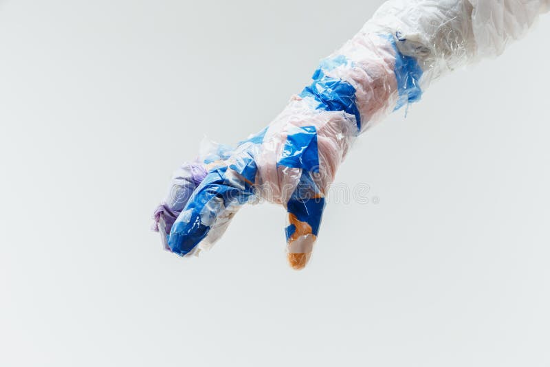 Big Plastic Hand Made of Garbage on White Studio Background Stock Image ...