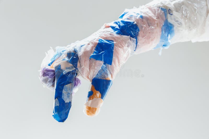 Big Plastic Hand Made of Garbage on White Studio Background Stock Image ...