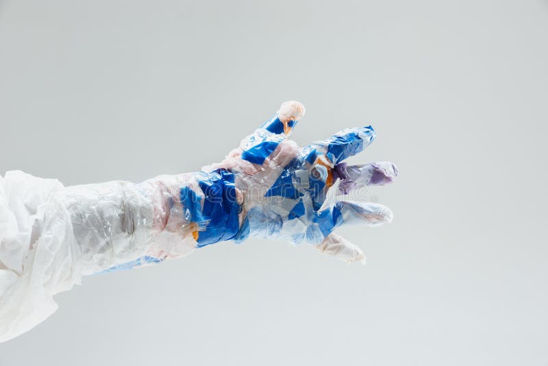 Big Plastic Hand Made of Garbage on White Studio Background Stock Image ...