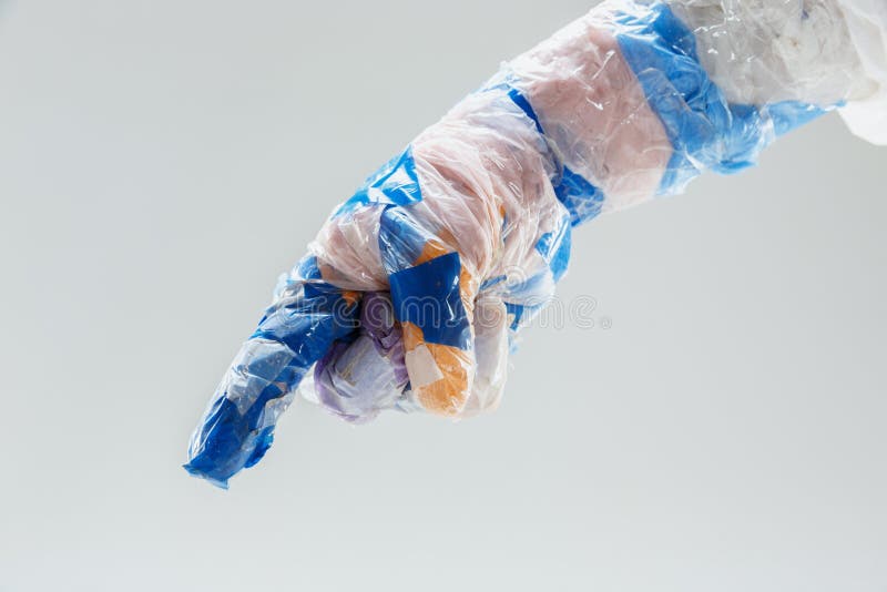 Big Plastic Hand Made of Garbage on White Studio Background Stock Image ...