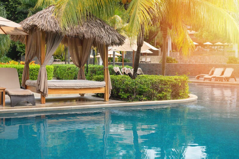 Big pool with canopy stock image. Image of blue, chair - 263022961