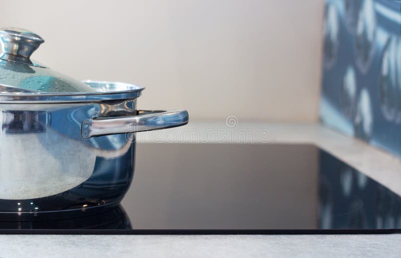 Big Pot in Modern Kitchen with Induction Stove Stock Photo - Image of ...