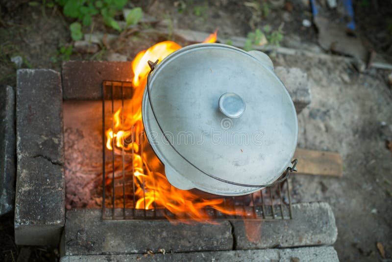 The Big Pot is Standing on the Bonfire Stock Photo - Image of forest ...