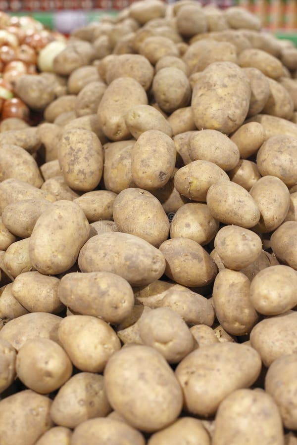 Big potatoes in a grocery stock image. Image of group - 27298445