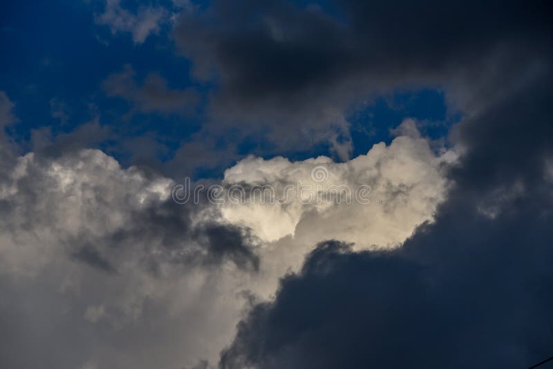 The Big Powerful Storm Clouds before a Thunderstorm at Sunset Stock ...
