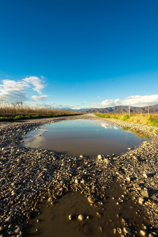 Big puddle in the country stock image. Image of health - 38229535