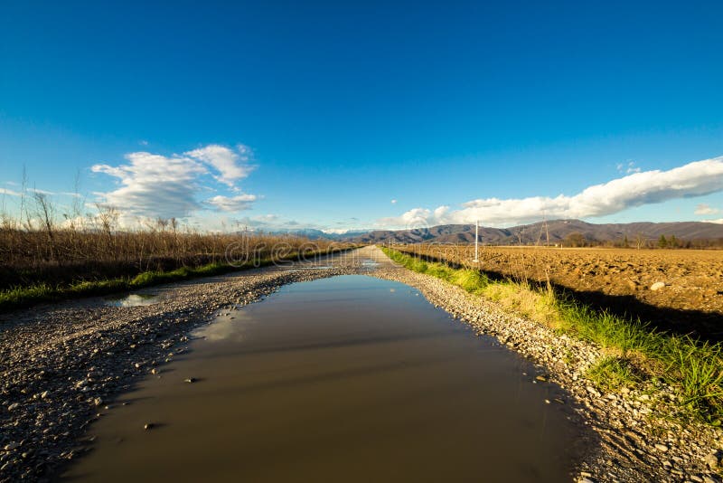 Big puddle in the country stock image. Image of beauty - 40108165