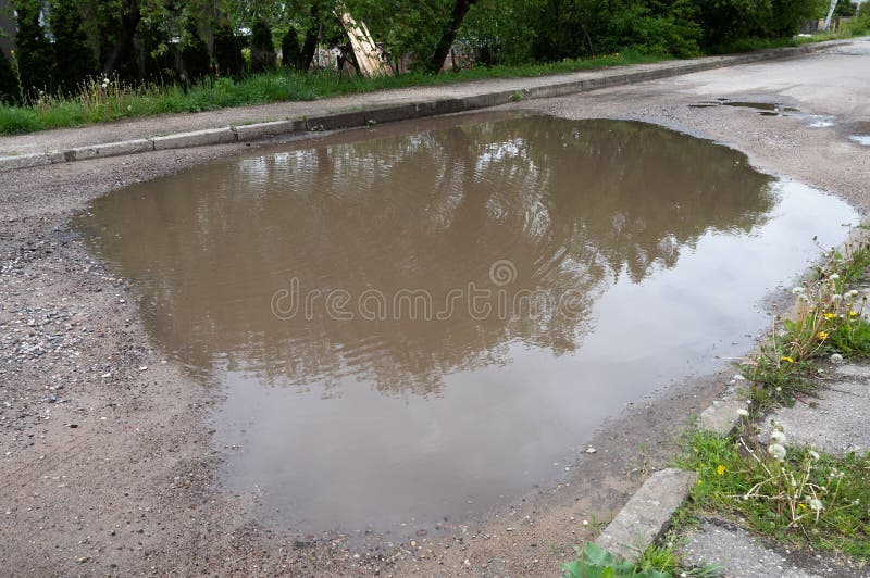 420 Dirt Road Big Puddle Stock Photos - Free & Royalty-Free Stock ...