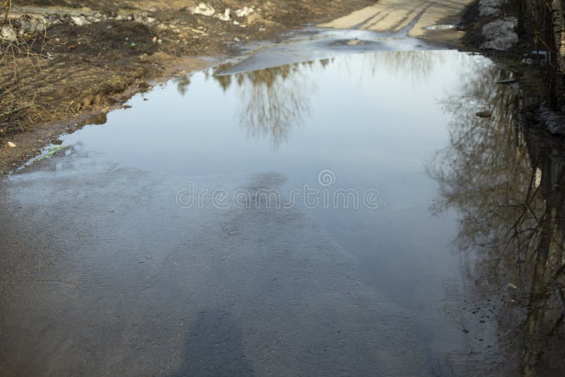 Big Puddle in Road. Water on Asphalt Stock Photo - Image of drop ...