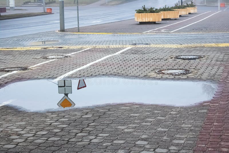 Big Puddle on the Sidewalk in City Stock Image - Image of town ...