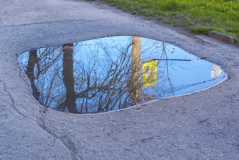 Big Puddle on the Sidewalk. Stock Image - Image of pavement, night ...