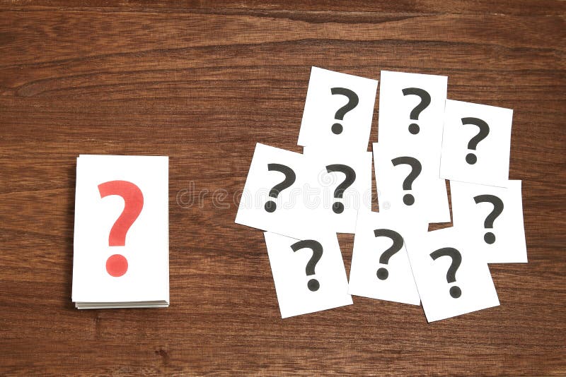 Big Question Mark on a Piece of Paper. Many Question Marks on Paper ...