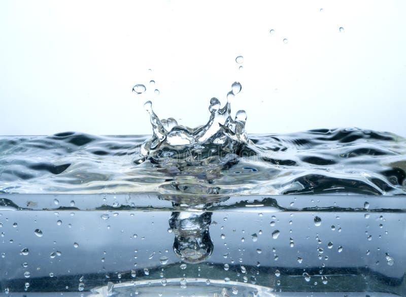 Big Rain Drop Falls on a Wavy Water Surface with a Lot of Splashes ...