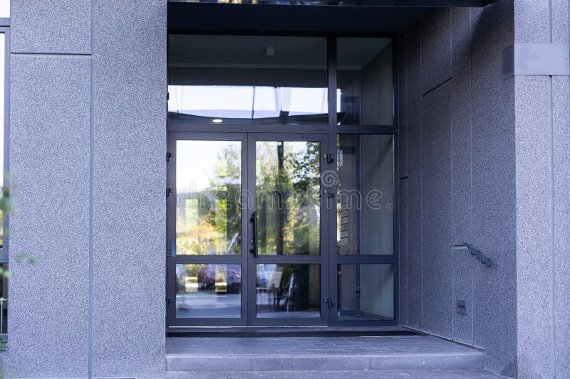 Big Rectangular Black Window in an Office Building Facade with Ashlar ...