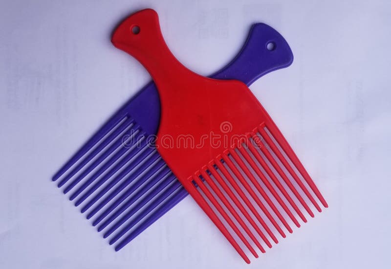 Big Red and Blue Comb on a White Background Stock Photo - Image of ...