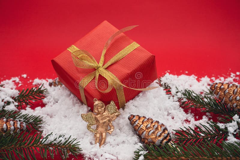 A Big Red Christmas Gift Box Lies on the Snow Stock Photo - Image of ...