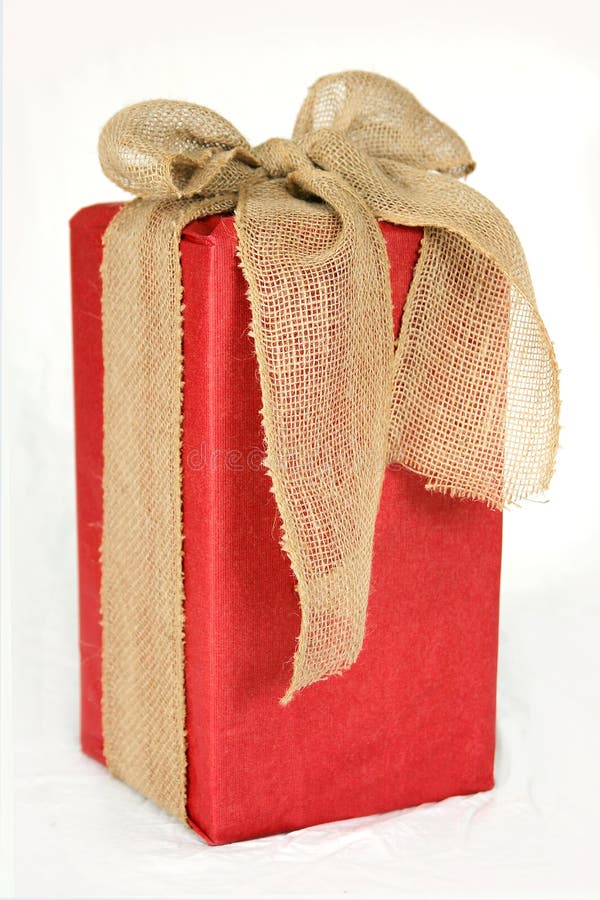 Big Red Christmas Gift Box Wrapped in Burlap Bow Stock Photo - Image of ...