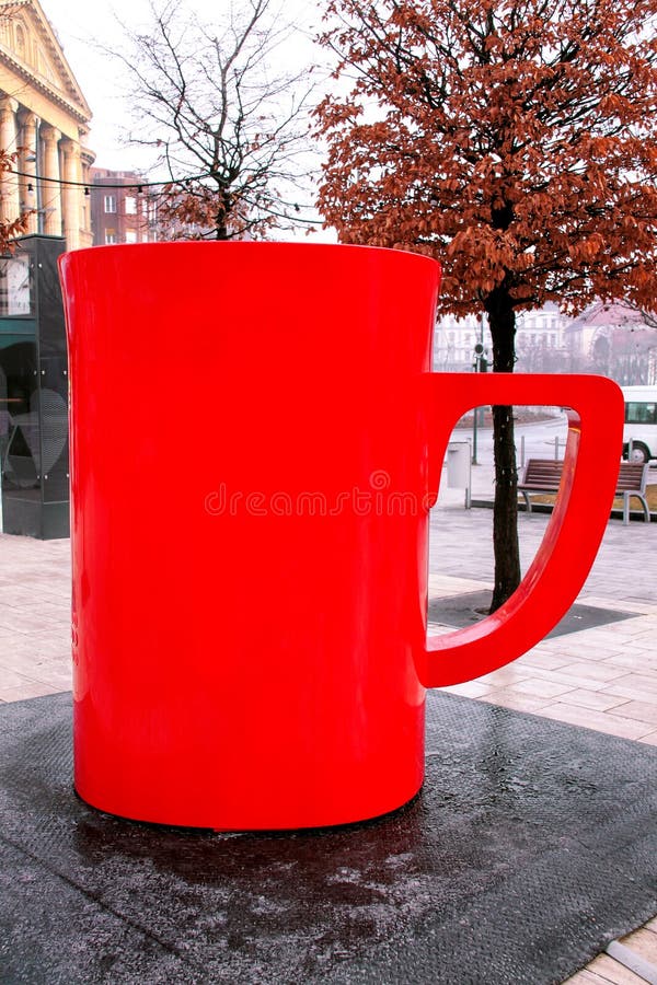 Big red cup on the streets editorial image. Image of color - 101743755