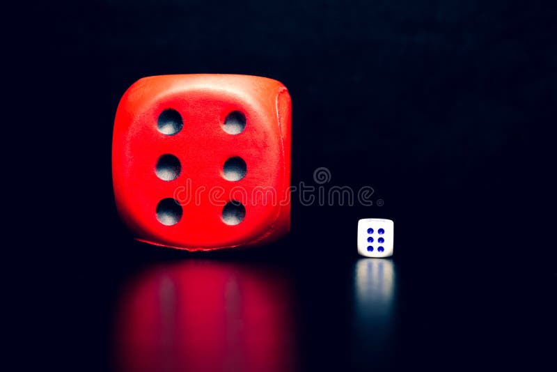 Big Red Dice Next To a Small White Dice Stock Photo - Image of poker ...