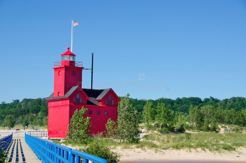 Big Red Lighthouse in Michigan Stock Image - Image of maritime, beach ...