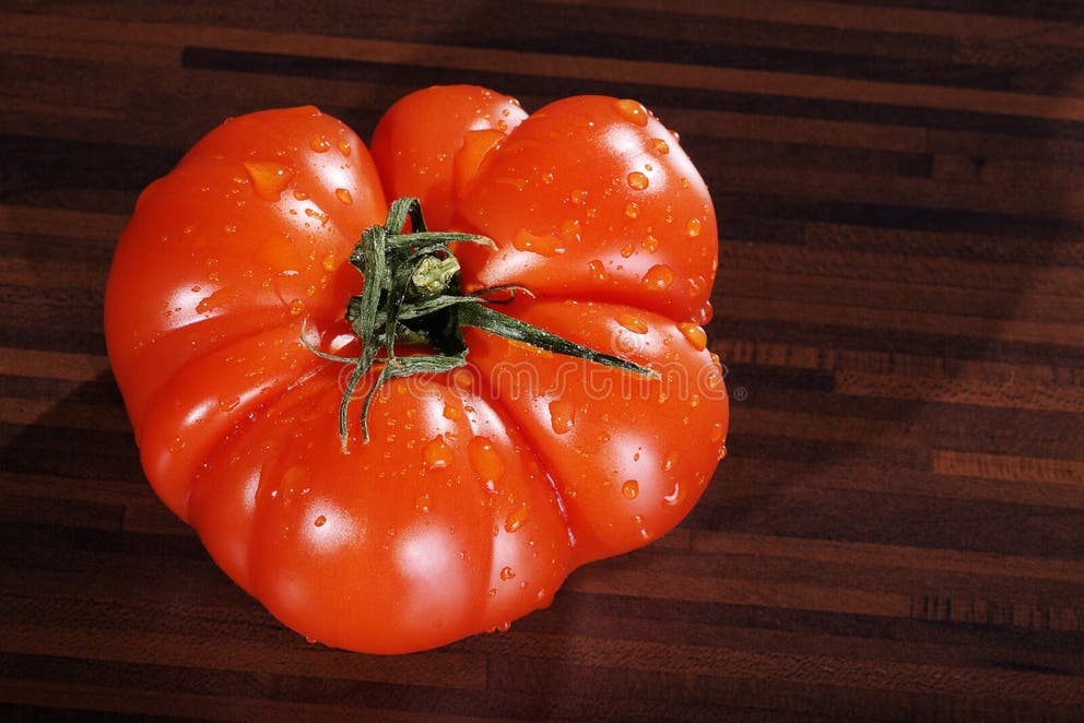 A big red meat tomato stock image. Image of ketchup, restaurant - 38781383