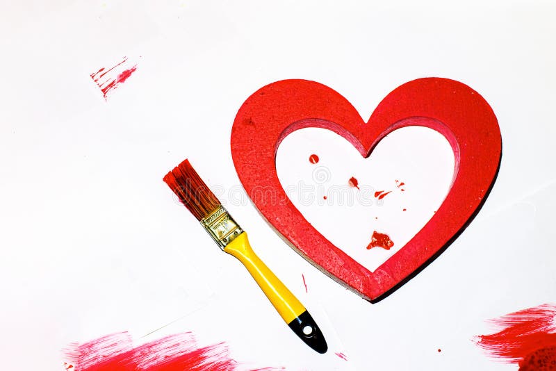 The Big Red Painted Heart with a Brush on a White Background Stock ...