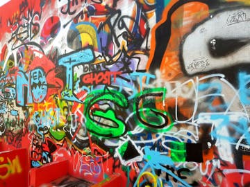 Big red wall with graffiti editorial image. Image of graffiti - 189896785