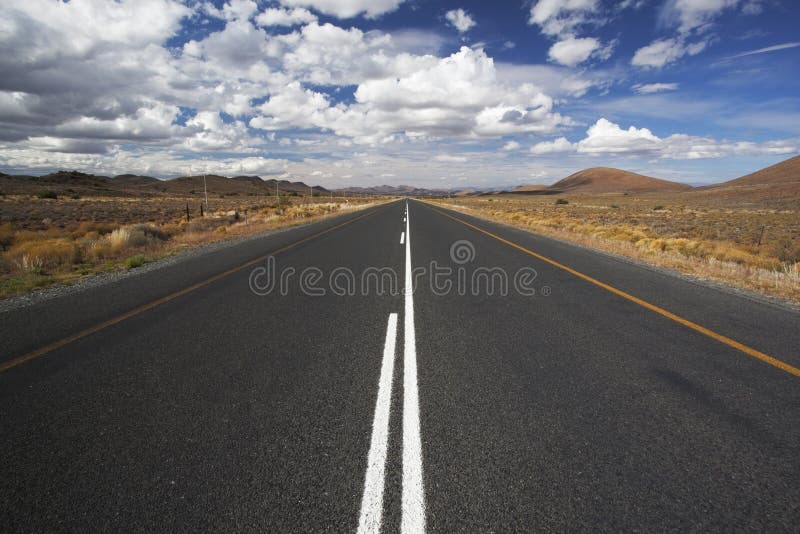Big Road stock photo. Image of road, bush, rocks, clouds - 14292414