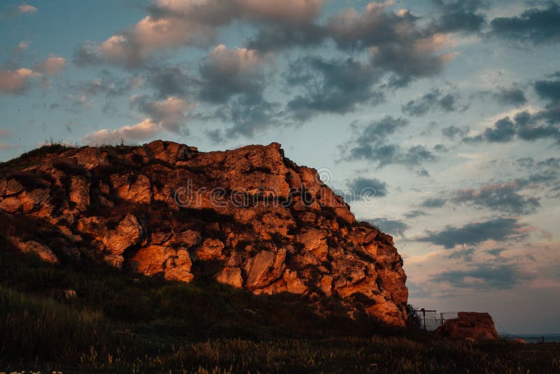 Big rock on the bank stock photo. Image of round, seaside - 54858290