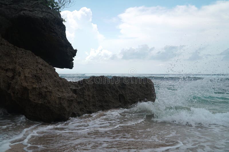 Big rock in the beach stock image. Image of holiday - 192144795