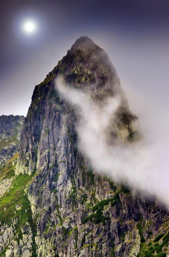 Big rock and mist scene stock image. Image of beautiful - 169501807