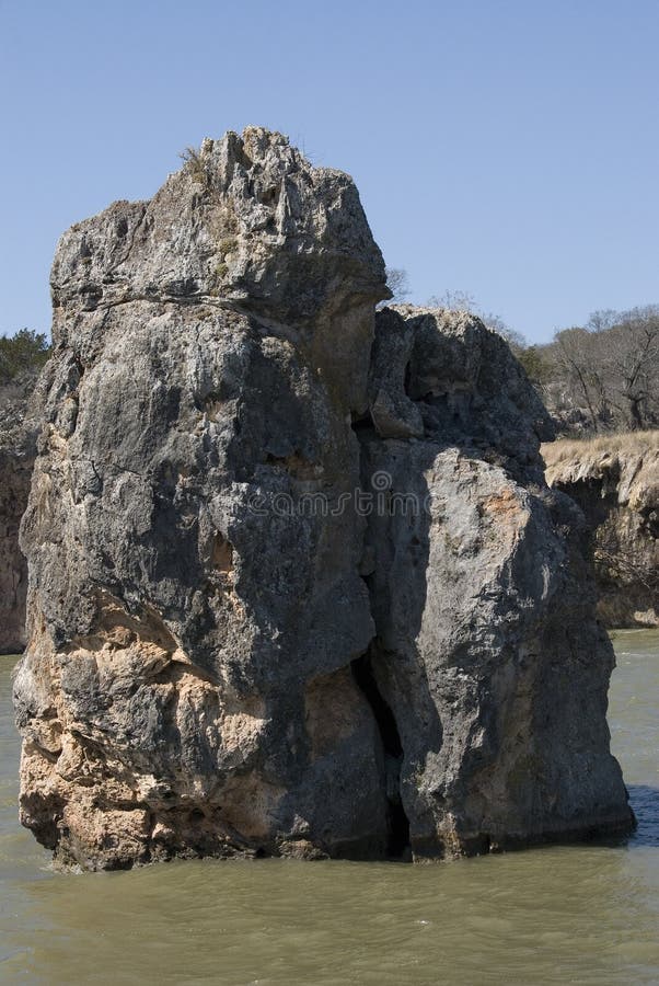 Big Rock in Lake stock image. Image of formation, geology - 4693077