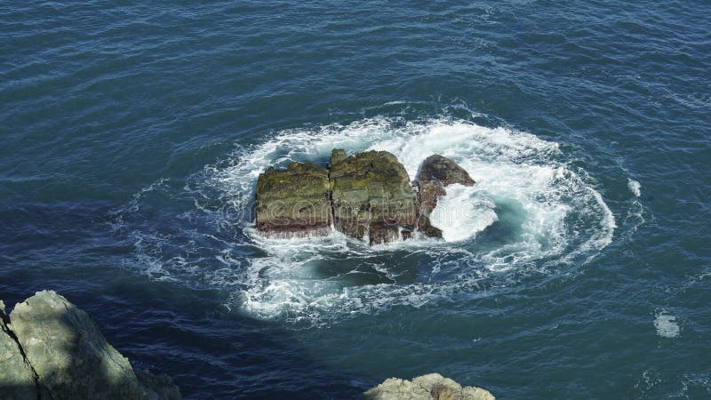 Big Rock in the Middle of the Ocean Stock Image - Image of coast, wave ...