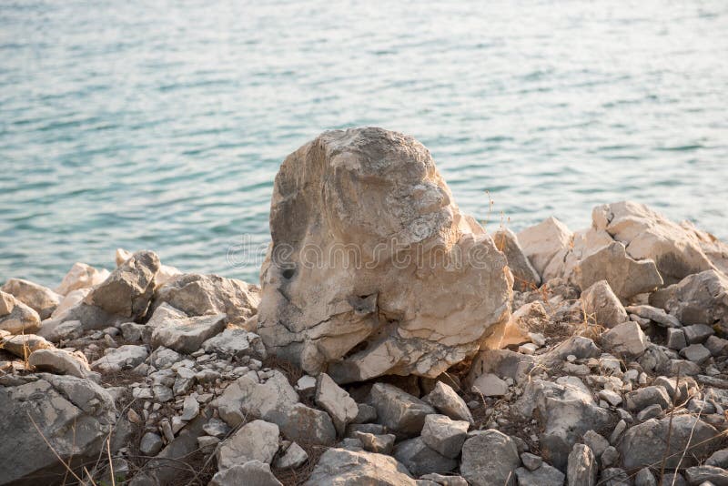 Big Rock on a Shore with Sea in Background. Stock Image - Image of rock ...