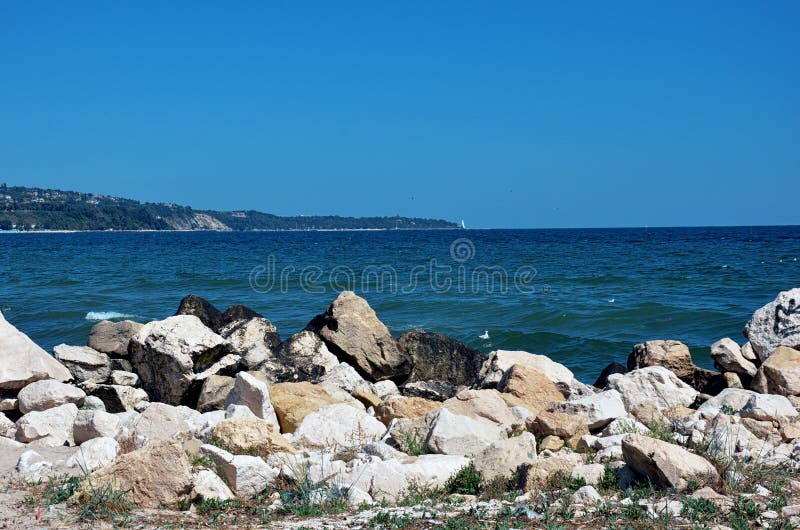 Big rocks on the beach stock photo. Image of blue, light - 73428842