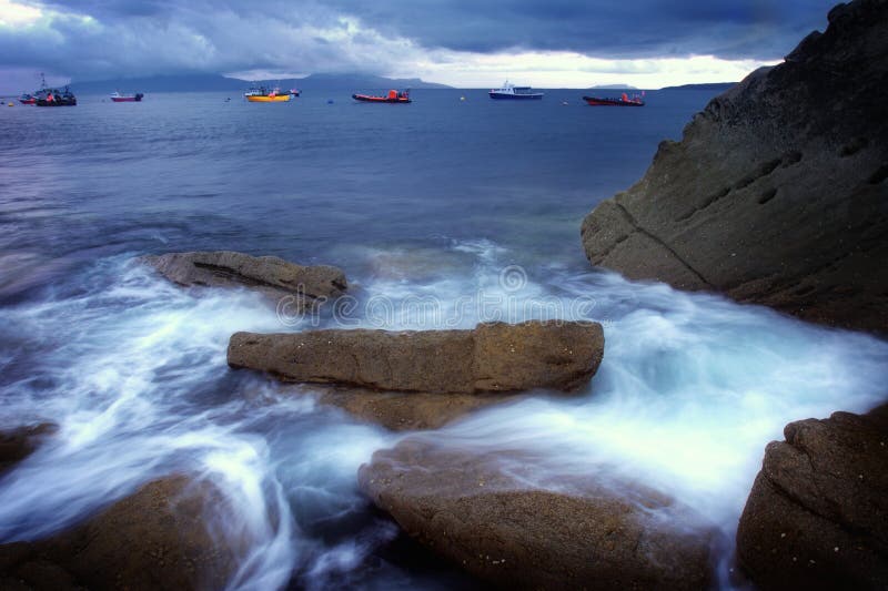 Big rocks at ocean shore stock photo. Image of scotland - 11453386