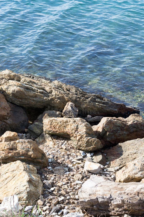 Big rocks on the sea beach stock image. Image of scenic - 66522323