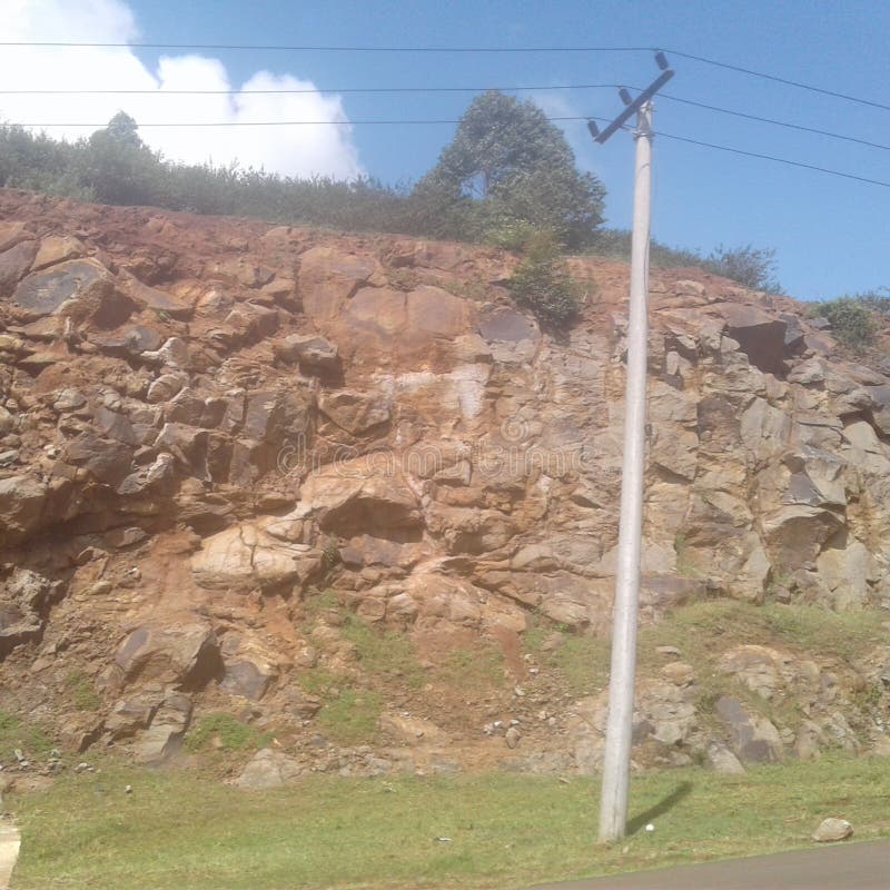 Big Rocks on Sides of Road and Clouds on Top Stock Image - Image of ...