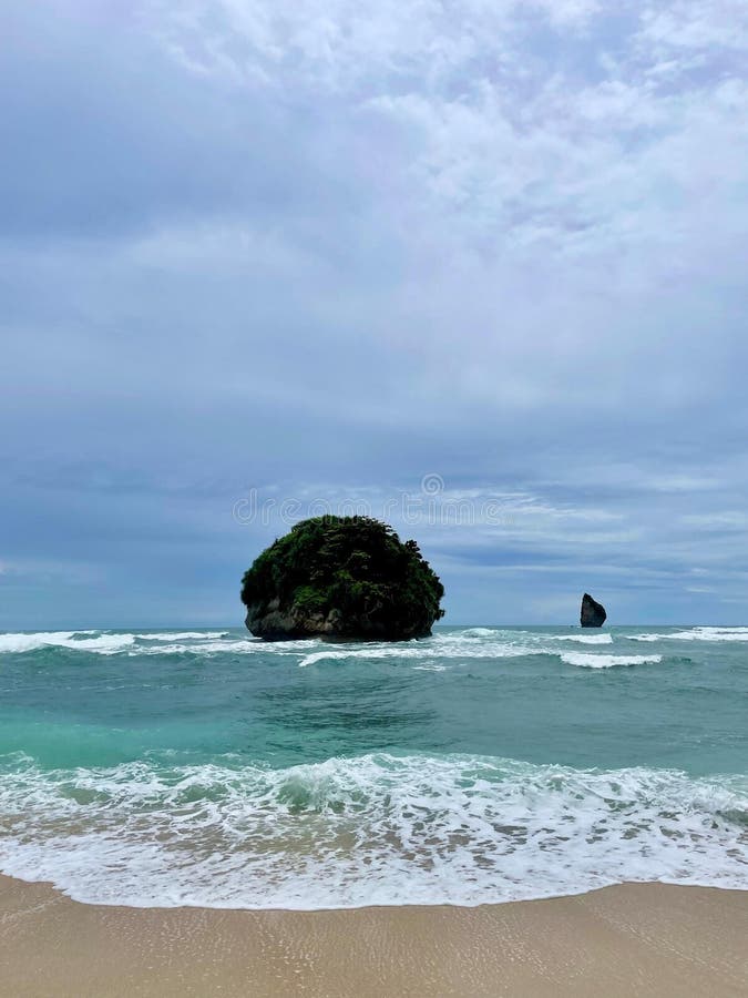 Big Rocks and Small Rocks in the Middle of the Sea Stock Image - Image ...