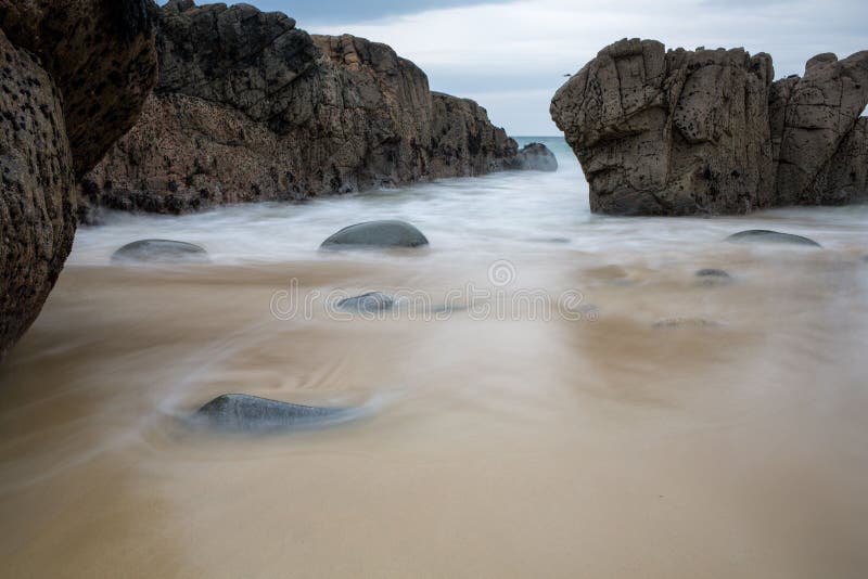 Big Rocks in the Water Surrounded by Rocky Cliffs in Isle of Harris ...