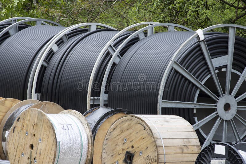 Big Rolls of Black Power Cable on Construction Site Stock Photo - Image ...