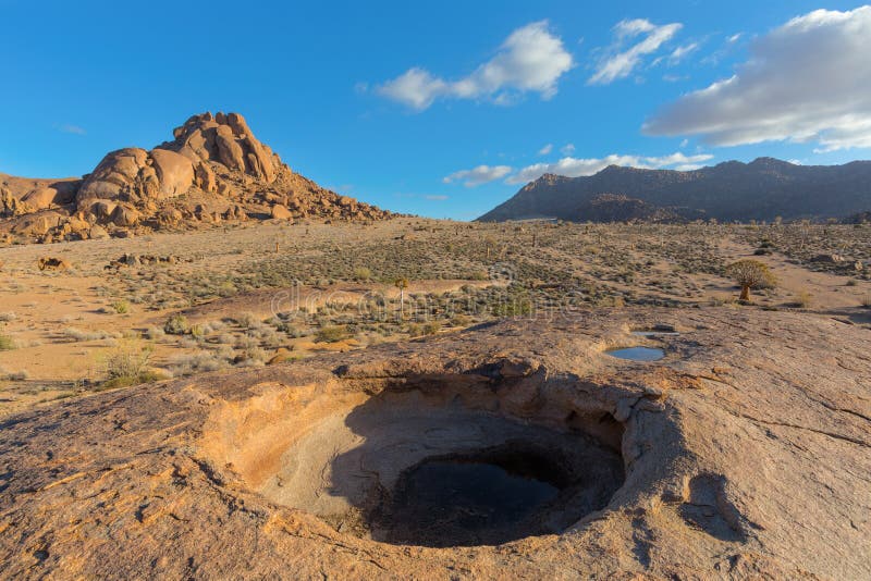 Big round hole in the rock stock photo. Image of sunlight - 59639236