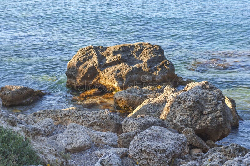 Big Sea Shore Rocky Cliff with Blue Sea Background Stock Image - Image ...
