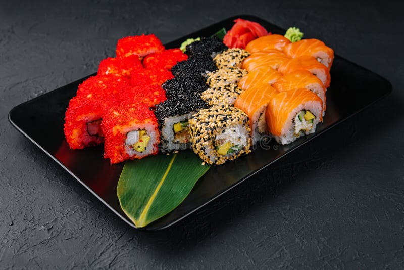 Big Set of Rolls on Black Tray Stock Photo - Image of fish, chopsticks ...