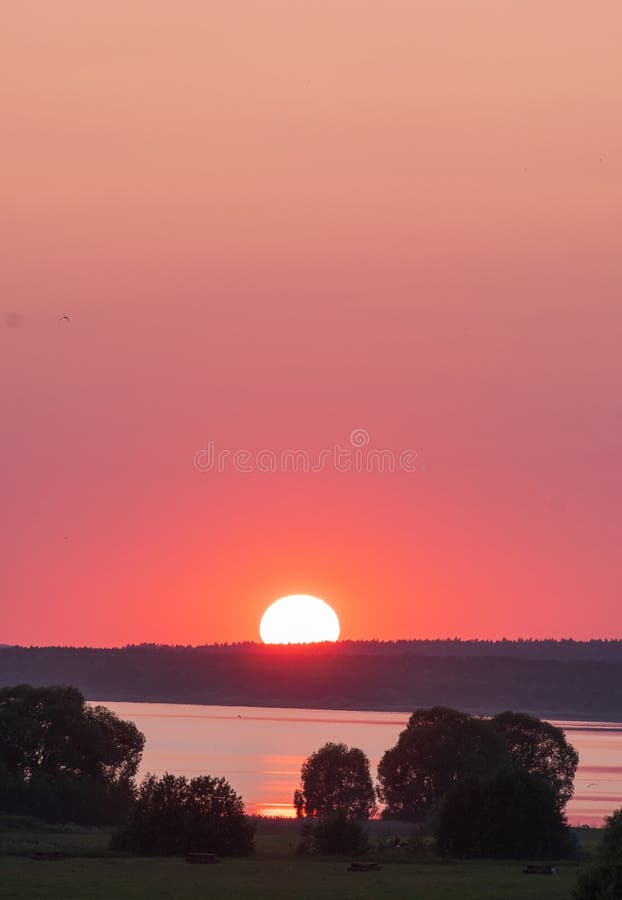 Sun setting in evening sea stock photo. Image of wallpaper - 104356180