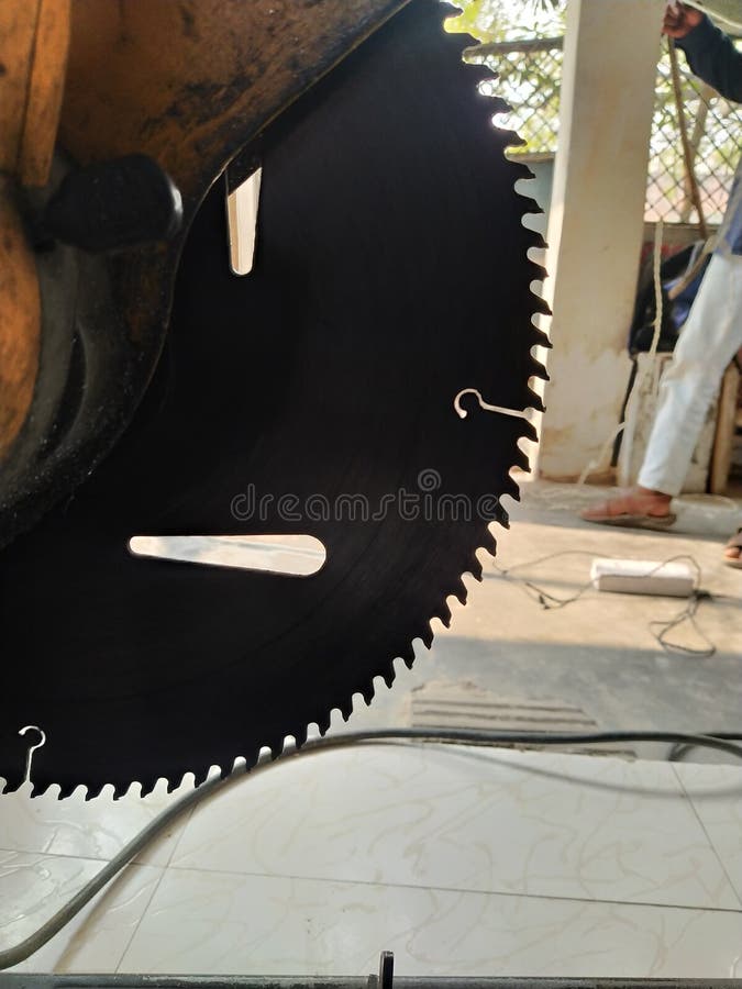 The Big Sharp Blades of the Dark Grinding Machine, Used for Cutting ...