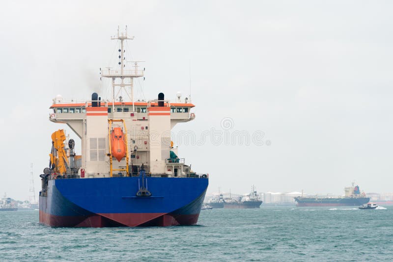 Dry Cargo Ship at Sunset stock photo. Image of passage - 11312134