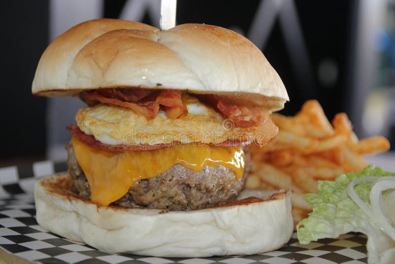 Big Single Cheeseburger with French Fries Stock Photo - Image of eggs ...